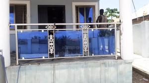 Stainless Steel Balustrades With Blue Reflective Glass in Adenta ...