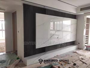 Sintered Stone Tv Wall Backdrop Design With Fluted Panels in Accra ...