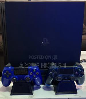 Playstation 4 Pro With Two Controllers and 4 Games in Circle - Video ...