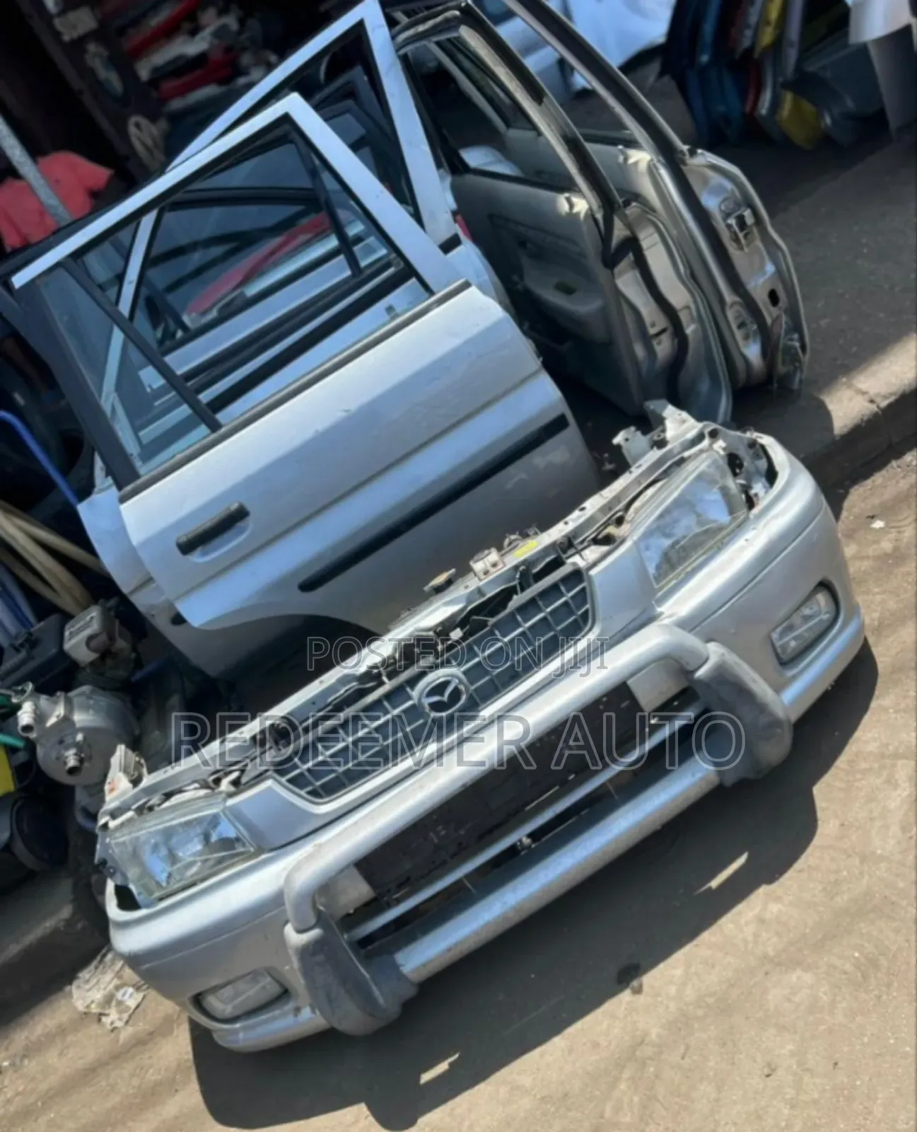 Mazda Demio Front Cut, Doors, Bonet, Fender, Boot, in Darkuman ...