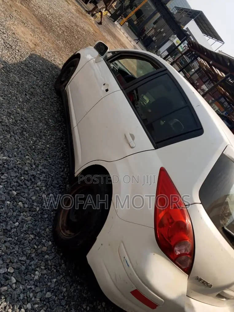 Nissan Versa 2012 White in Madina - Cars, Okyere Bright | Jiji.com.gh